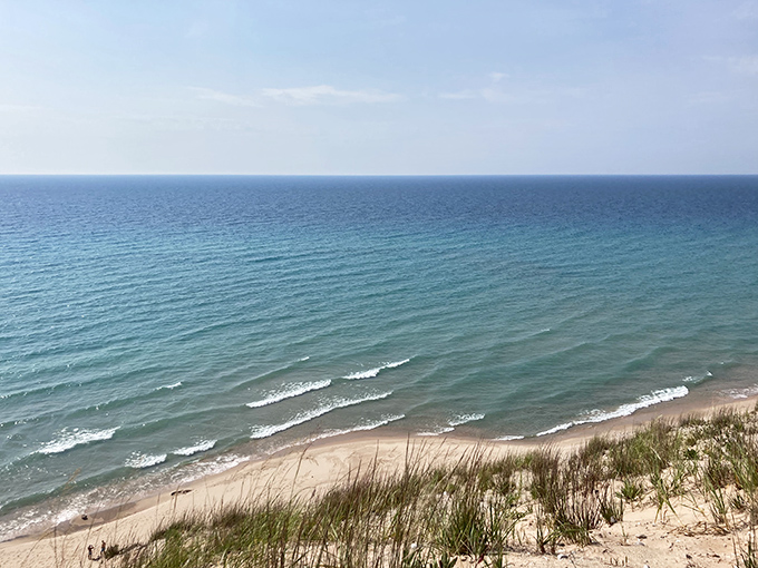 Gentle waves create nature's lullaby along pristine shores, where footprints disappear with each incoming tide.