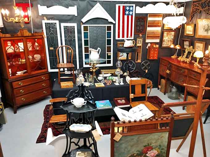 This vignette could be straight from a 1940s parlor, complete with American flag and furniture that's survived longer than most marriages.