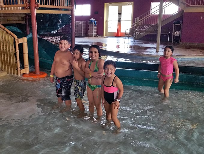 Pure, unfiltered joy &ndash; the universal expression of kids experiencing the simple magic of splashing in water together.