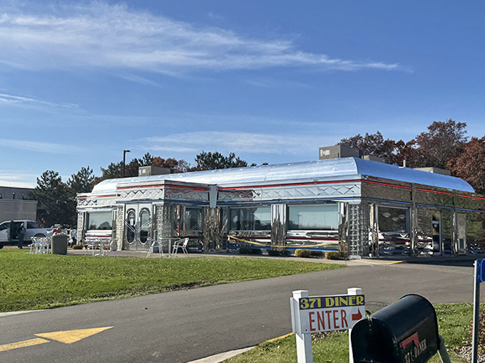 Standing proud against the Minnesota sky, this silver sentinel of sustenance promises good times and better food inside.