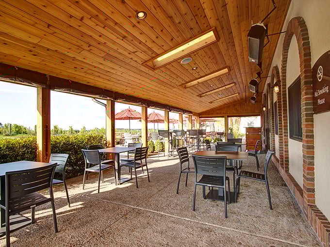 Under the covered patio, tables await wine enthusiasts ready to pair spectacular views with equally impressive vintages.