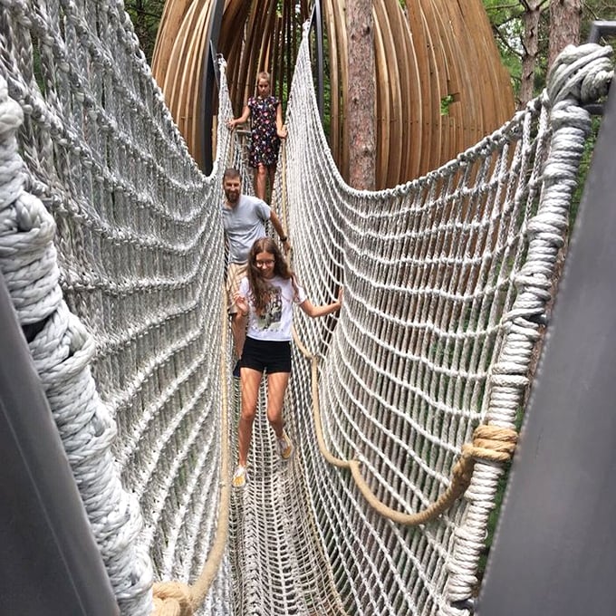 The rope bridge offers just enough gentle sway to add a thrill without scaring away the less adventurous.