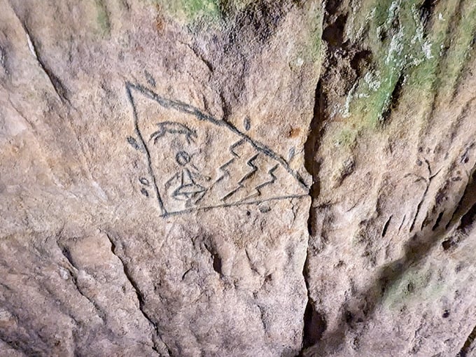 Historical petroglyphs etched into sandstone walls tell stories from visitors who left their mark long before Instagram existed.