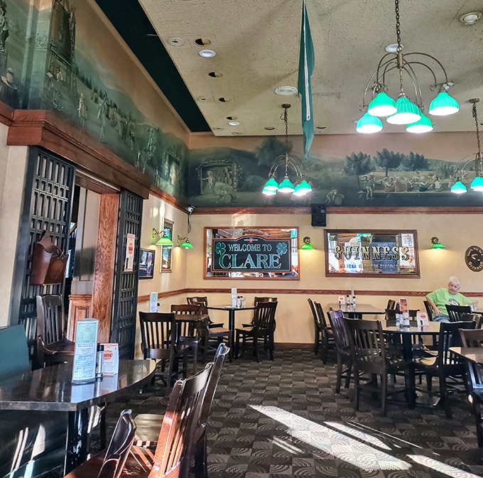 The pub area's distinctive green-and-wood color scheme creates a cozy atmosphere that makes you want to settle in for "just one more" before heading home.
