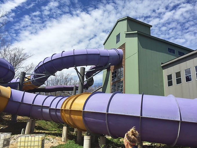 Colorful tubes snake outside the main building, promising thrilling descents with views of the Michigan sky.