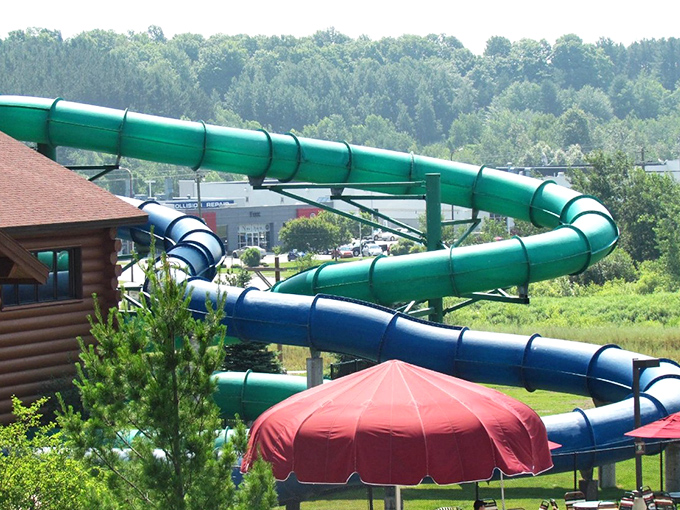Engineering marvels in green and blue snake through the Michigan sky, promising heart-pounding descents and unforgettable screams of delight.