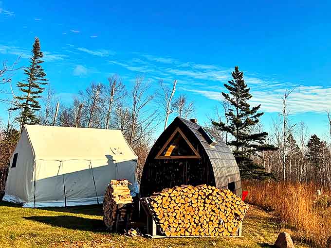 Neatly stacked firewood promises future warmth, a reminder that the best experiences often come from the simplest elements.
