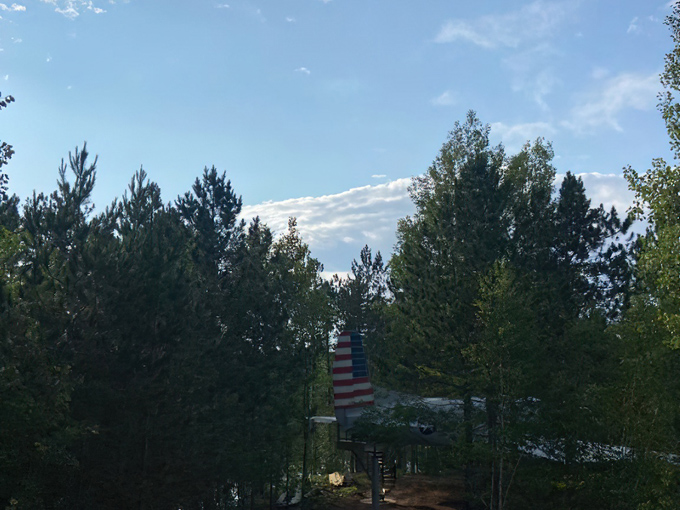 The aircraft's elevated position provides stunning views of the surrounding Wisconsin wilderness throughout all seasons.