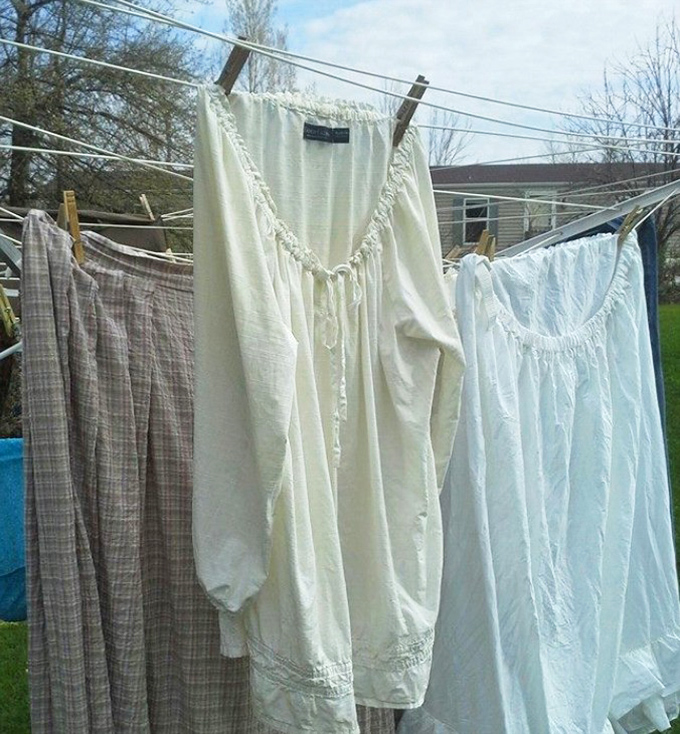 Laundry day in the 1800s: these simple garments required hours of labor to clean without the modern conveniences we take for granted.