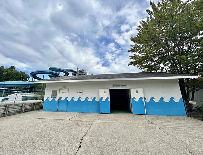Restroom facilities feature cheerful wave decorations because even practical necessities deserve a touch of whimsy at Adventure Island.