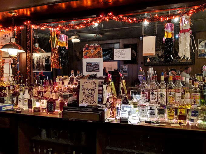 Alcohol and Cash Register: Behind the bar, bottles gleam like liquid history &ndash; some fancy, some familiar, all served with authentic Detroit attitude.