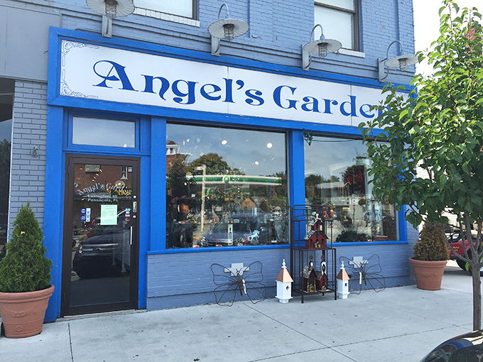 Angel's Garden's vibrant blue storefront promises whimsical treasures inside, where coastal-inspired d&eacute;cor awaits those looking to bring vacation vibes home.