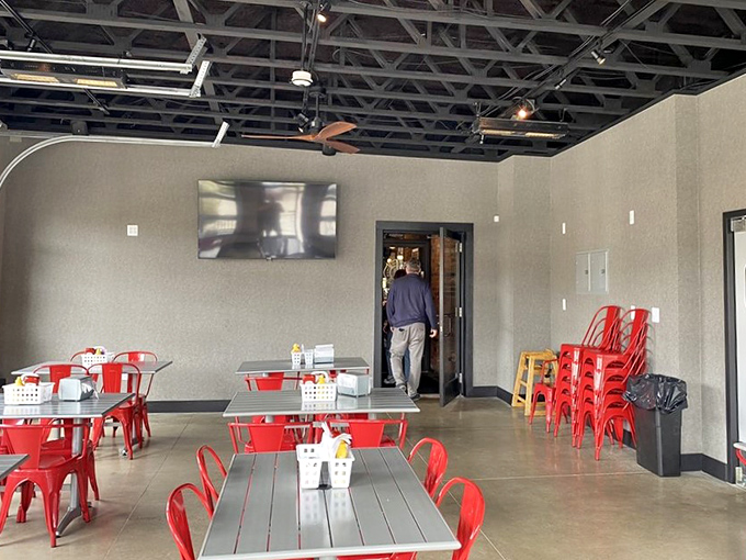 Modern seating with splashes of firefighter red keeps the theme going while providing comfortable spots for culinary adventures.