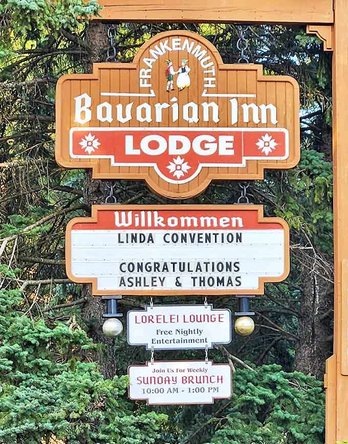 The iconic Bavarian Inn Lodge sign welcomes guests with traditional German styling and helpful information about current events and offerings.