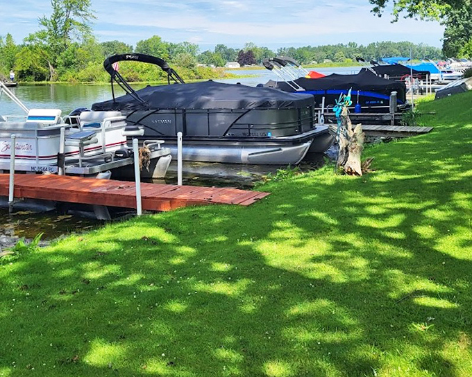 Watercraft waiting for adventure: Boats rest at their docks like patient friends, ready to explore Craig Lake's inviting waters.