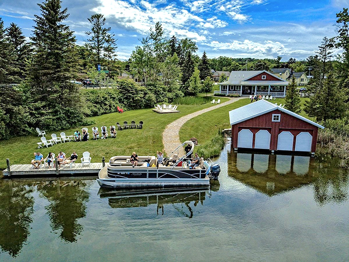 A bird's-eye view reveals Boathouse Vineyards' perfect integration of water, wine, and welcoming spaces &ndash; Michigan's answer to Mediterranean wine destinations.