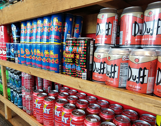 The Duff Beer display would make Homer Simpson weep with joy, proving that fictional beverages deserve real shelf space in this carbonated wonderland.