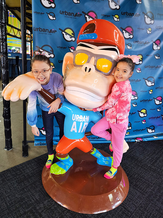 The park's mascot stands ready for photo ops, sporting the confident look of someone who never has to worry about fitting into skinny jeans.