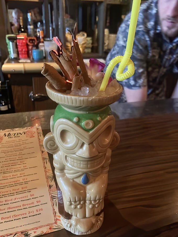 This tiki creation arrives with enough garnish to qualify as a small garden – drink your cocktail, then eat your vitamins!