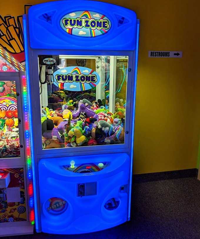 "Just one more try!" The claw machine stands as a monument to hope, persistence, and the universal belief that this time will be different.