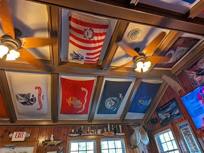 Military flags honor service members while adding to the tavern's distinctive character &ndash; a place that wears its values proudly.