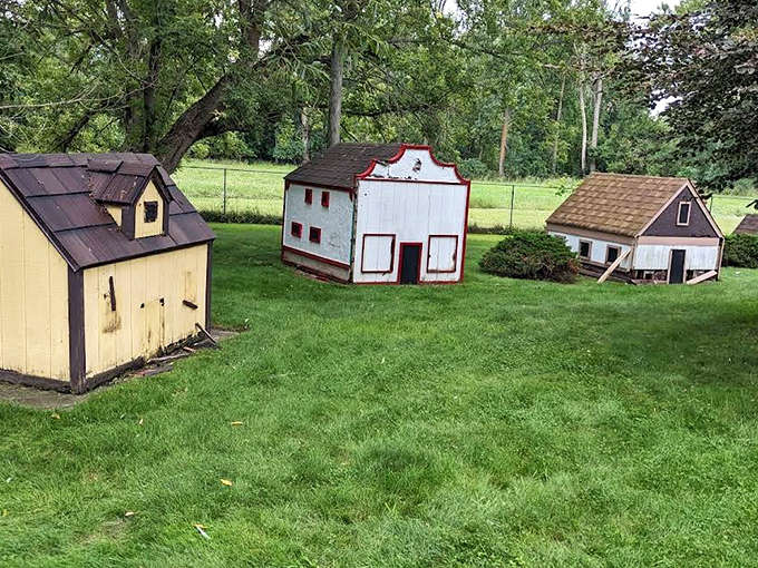 These charming miniature buildings add storybook appeal to every hole, some even leaning at angles that would terrify actual architects.