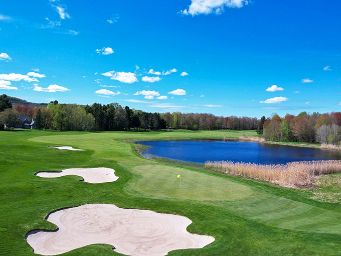 Golf season transforms The Highlands into a different kind of playground. Those bunkers look challenging, but that view is worth it!
