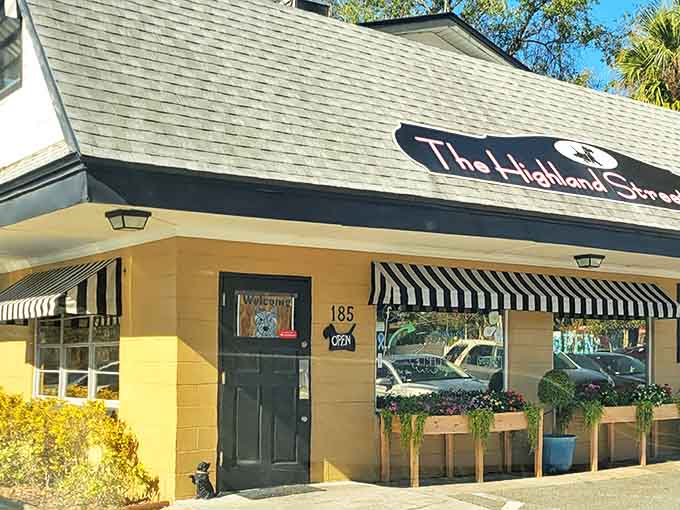 The Highland Street Cafe's cheerful yellow exterior promises comfort food served with a side of local gossip and genuine smiles.