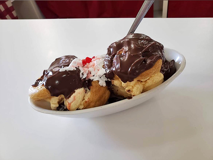 The hot fudge cream puff doesn't just break the rules of dessert &ndash; it rewrites them completely, with delicious, gooey authority.