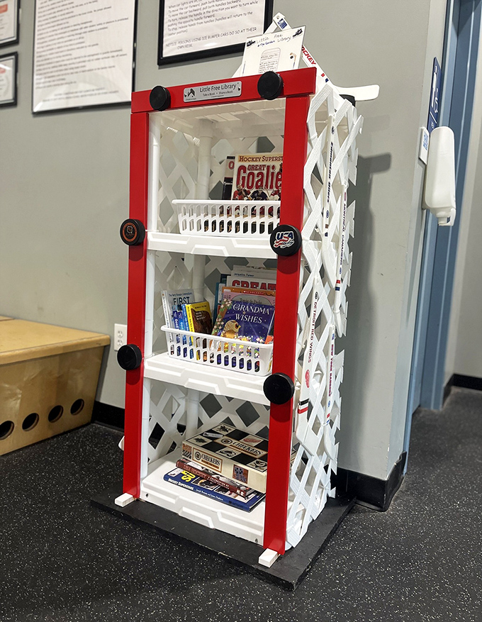 The arena's little free library offers reading materials for visitors, combining literacy with recreation in a thoughtful touch.