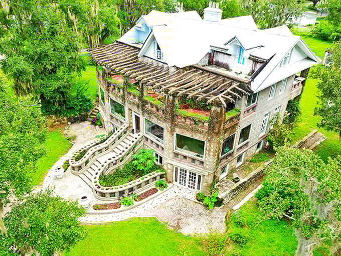 From above, the Wonder House reveals its true scale and integration with the surrounding landscape of towering Florida oaks.