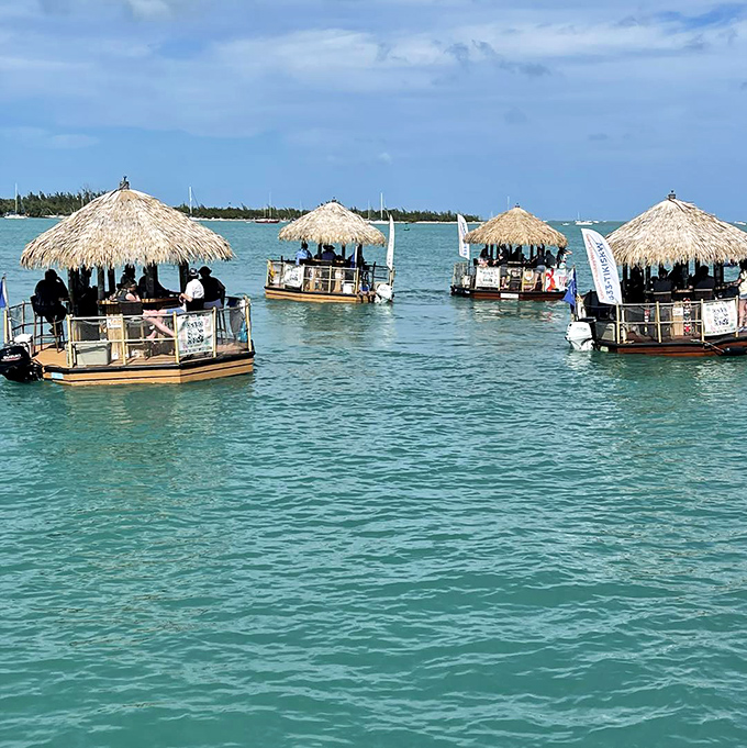 A mini armada of motorized tiki huts creates a whimsical sight that perfectly captures the playful spirit of the Florida Keys.