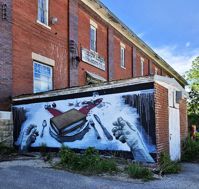 A striking mural outside depicts hands preparing to devour a book &ndash; literally feeding the mind with literary sustenance.