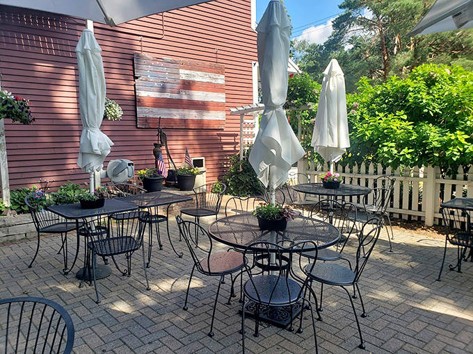 The peaceful patio offers shaded seating where visitors can savor treats while enjoying Minnesota's beautiful summers.