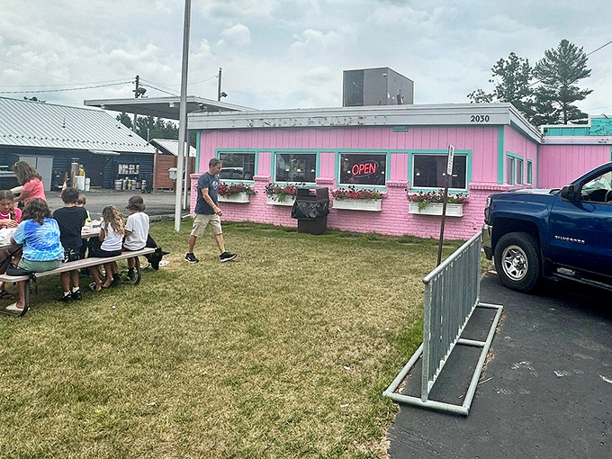 Pink picnic tables offer al fresco dining options for those beautiful Michigan summer days when everything tastes better outside.