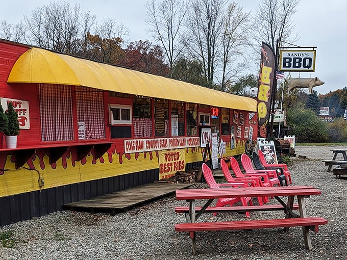 The outdoor setting provides the perfect backdrop for serious barbecue consumption – picnic tables where memories and sauce stains are made.