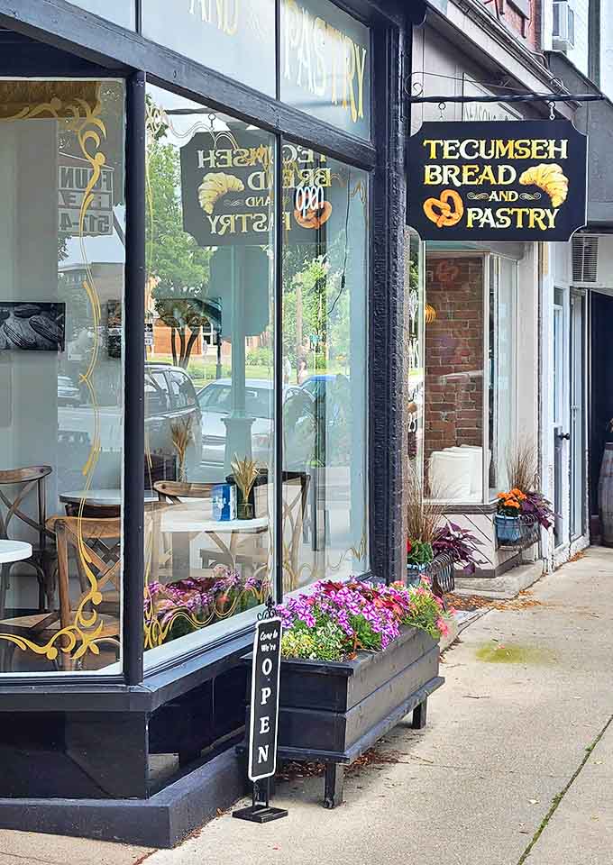 Flower boxes and an inviting storefront create curb appeal that's impossible to resist. The "OPEN" sign might as well say "ENTER AT RISK TO YOUR WAISTLINE."