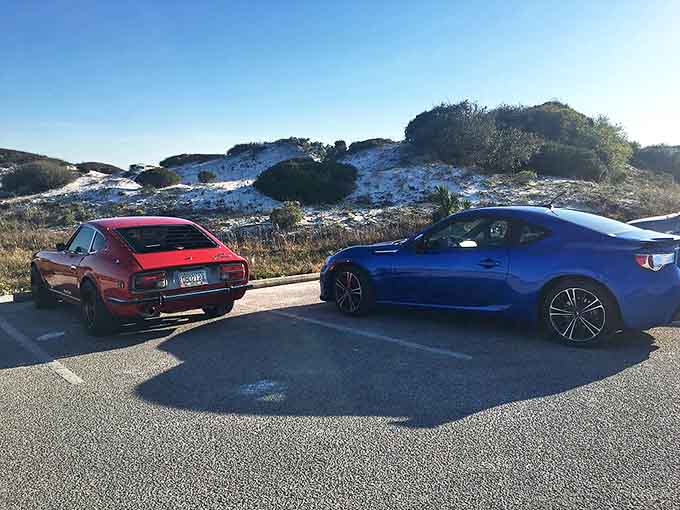 Even the parking area at Grayton Beach offers scenic views &ndash; these sports cars clearly came for the curves ahead.