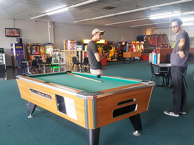 The billiards table provides another entertainment option, perfect for friendly competition when you need a break from racing.