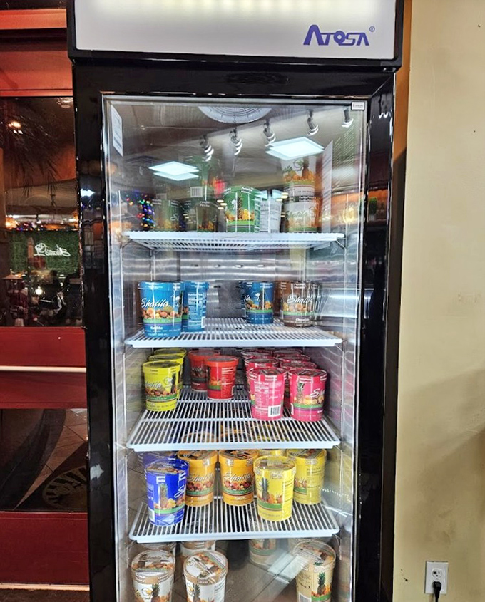 Even the refrigerated case tells a story &ndash; colorful cans of fruit nectars and traditional beverages offering the perfect complement to Shatila's sweet offerings.
