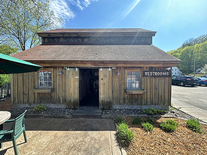 Even the restroom building embraces rustic charm, a wooden structure that looks like it could tell tales of decades of satisfied customers.
