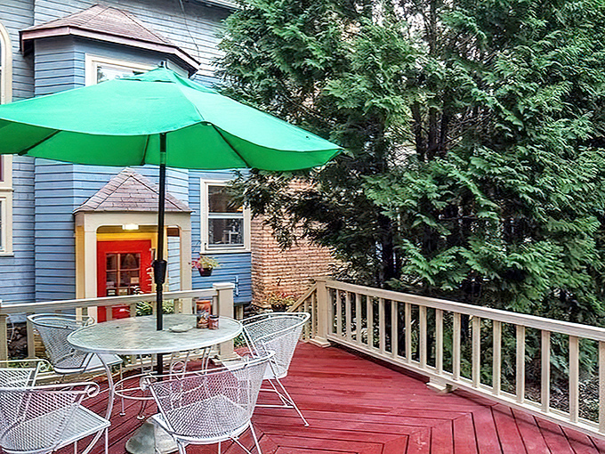 Private retreat with cheerful green umbrella, perfect for morning coffee or evening wine without nosy neighbors.