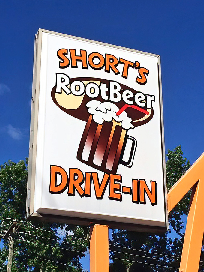 The iconic sign that's guided hungry travelers for decades, promising root beer and satisfaction just ahead.