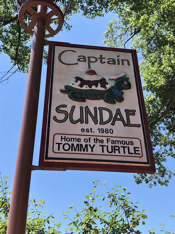 The iconic Captain Sundae sign stands tall, a beacon for sweet-toothed travelers and a promise of the Tommy Turtle experience below.