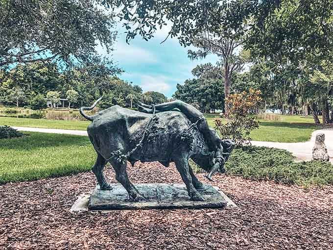 A bronze bull stands guard on the grounds, because every Venetian palace in Florida needs a touch of unexpected whimsy.