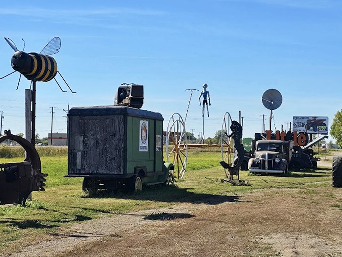 Metal sculptures cast dramatic shadows across the Minnesota landscape, creating a secondary art show that changes with the sun's position.