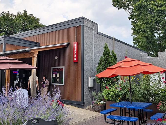 The Beacon's modern exterior houses some of Petoskey's most creative tacos, where bright umbrellas and lavender create an inviting entrance.