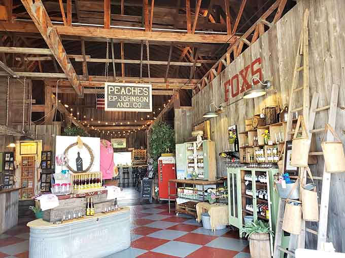 The gift shop's purple-hued corner showcases local treasures and wine-themed souvenirs that let you take a piece of the experience home.