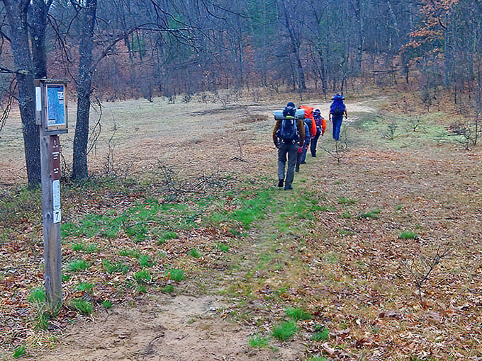 The journey begins where the pavement ends &ndash; backpack-laden adventurers follow nature's breadcrumb trail into the whispering woods.