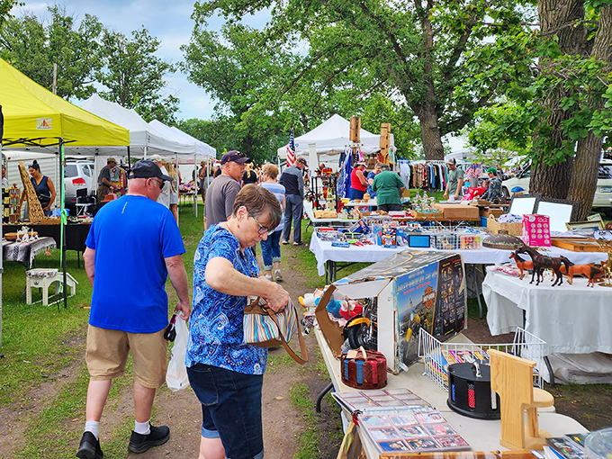 Weekend warriors of bargain hunting examine potential treasures, each table offering the possibility of that perfect unexpected find.